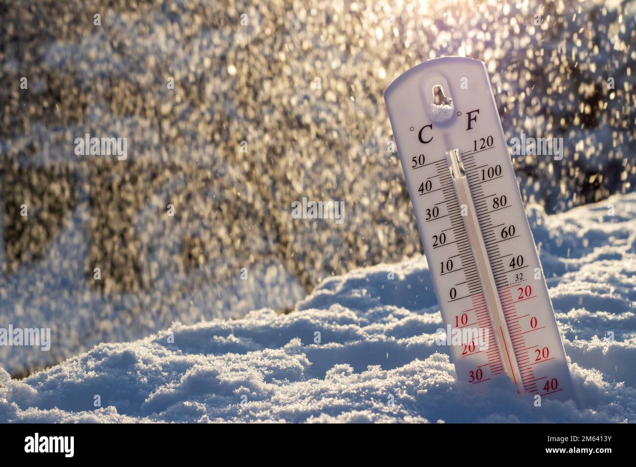 Thermometer with minus temperatures in the snow in winter hi-res stock ...