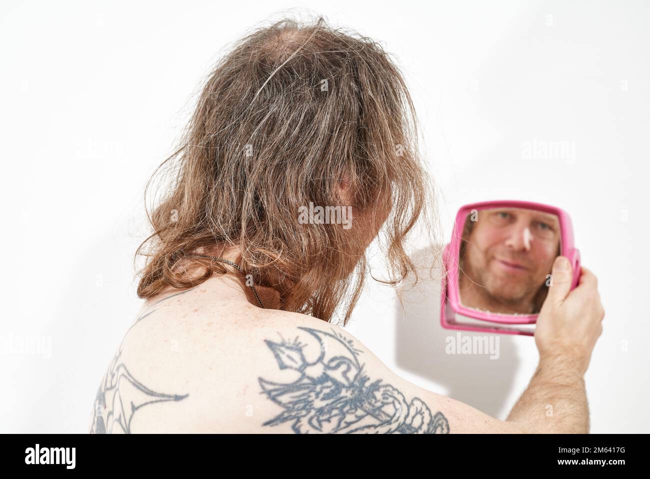 Person look mirror hi-res stock photography and images - Alamy