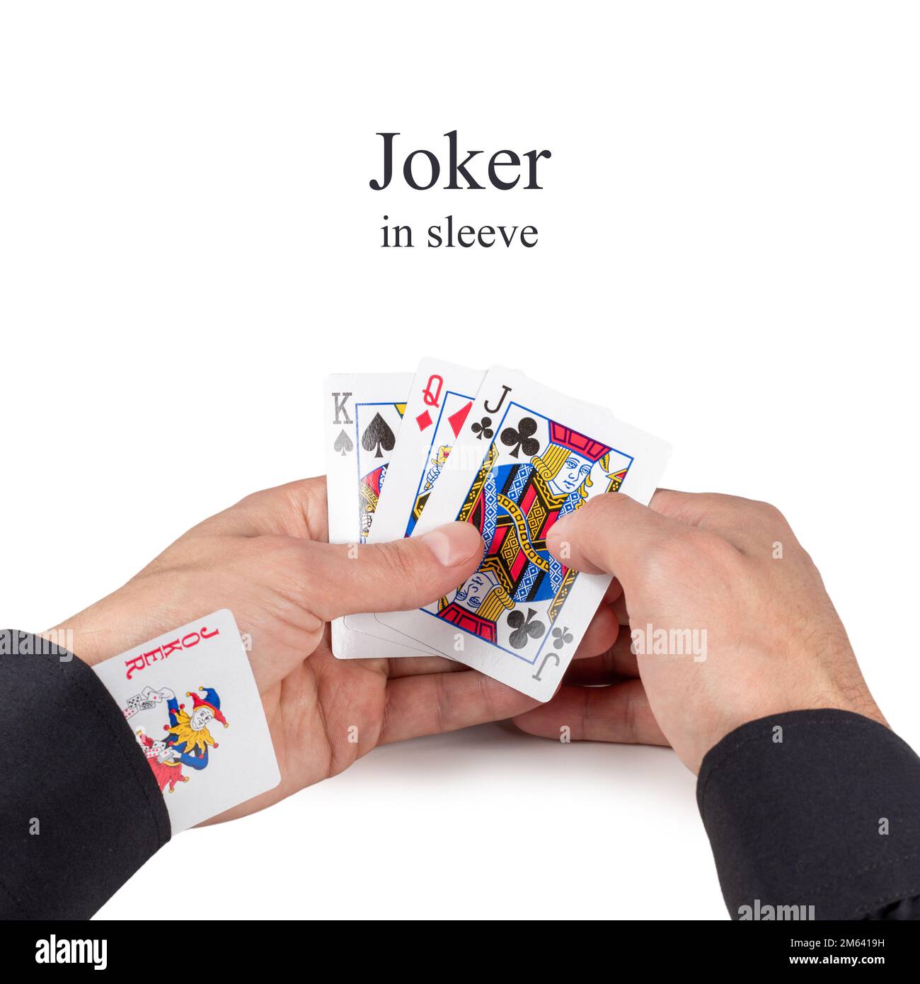 Concept - joker card in the sleeve. A man holding cards in his hands on ...