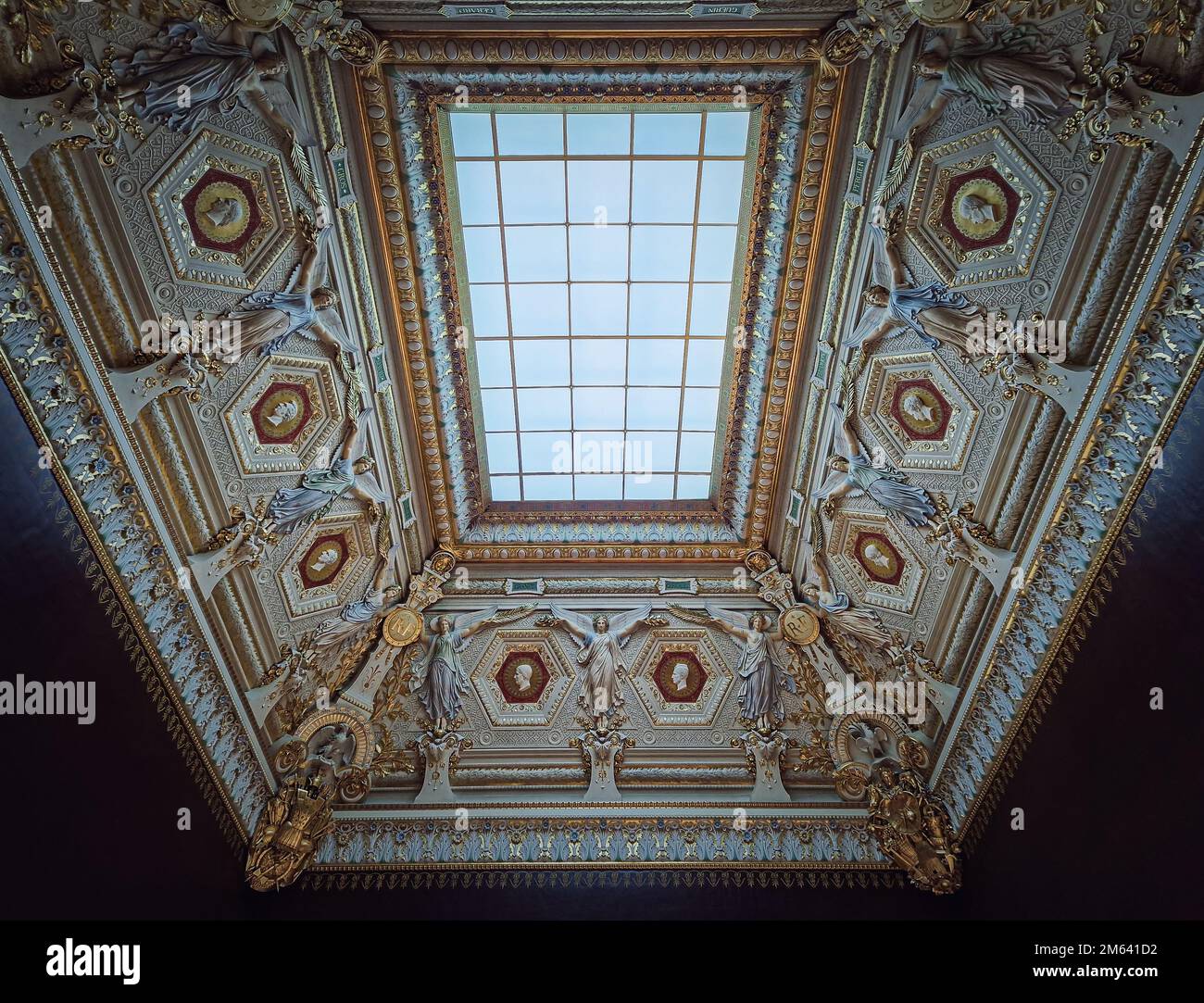 Louvre Palais ornate ceiling with glass window in center. Angels ...
