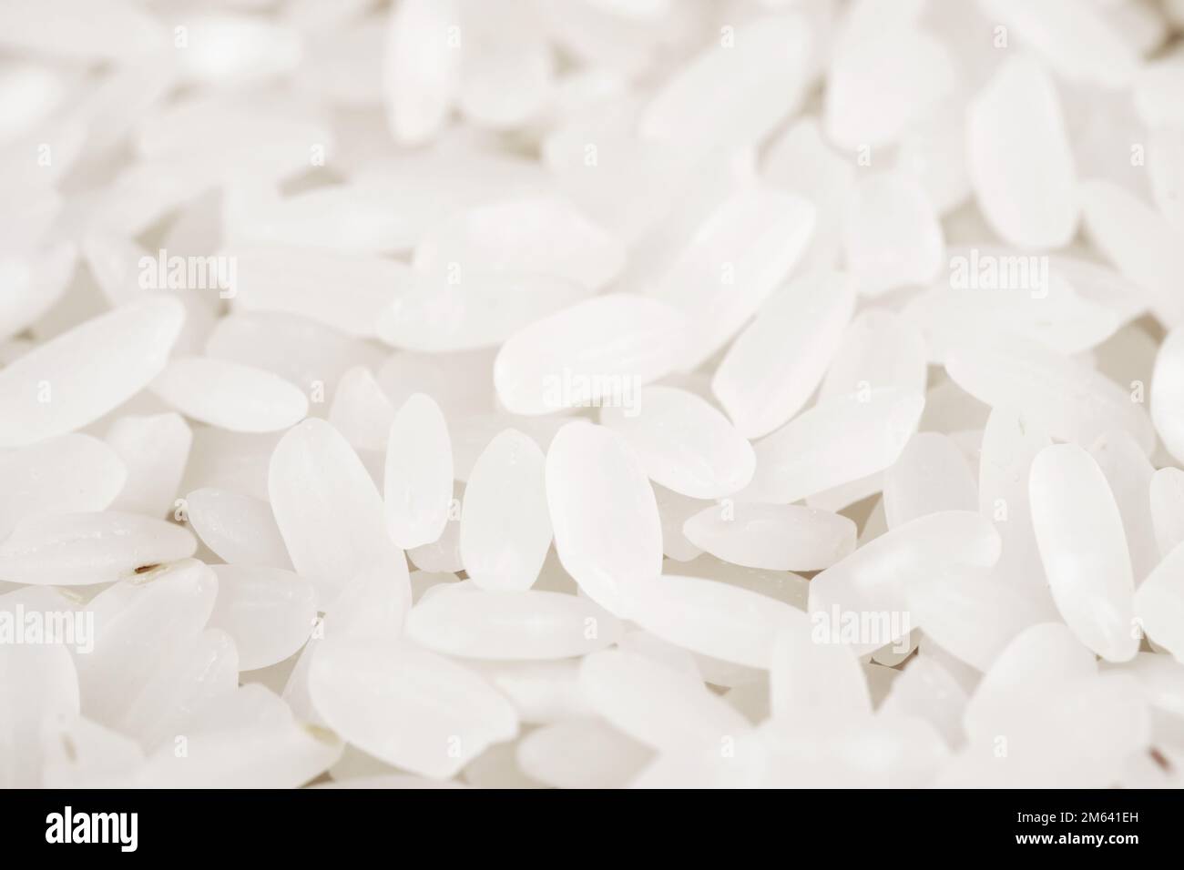 White long rice close up background, uncooked raw cereals, macro Stock ...