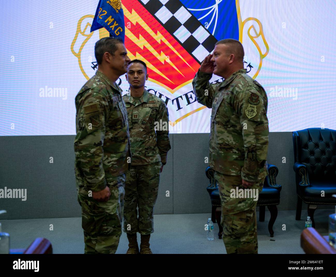 Col. Kyle Hosman renders his first salute as Maintenance commander to ...