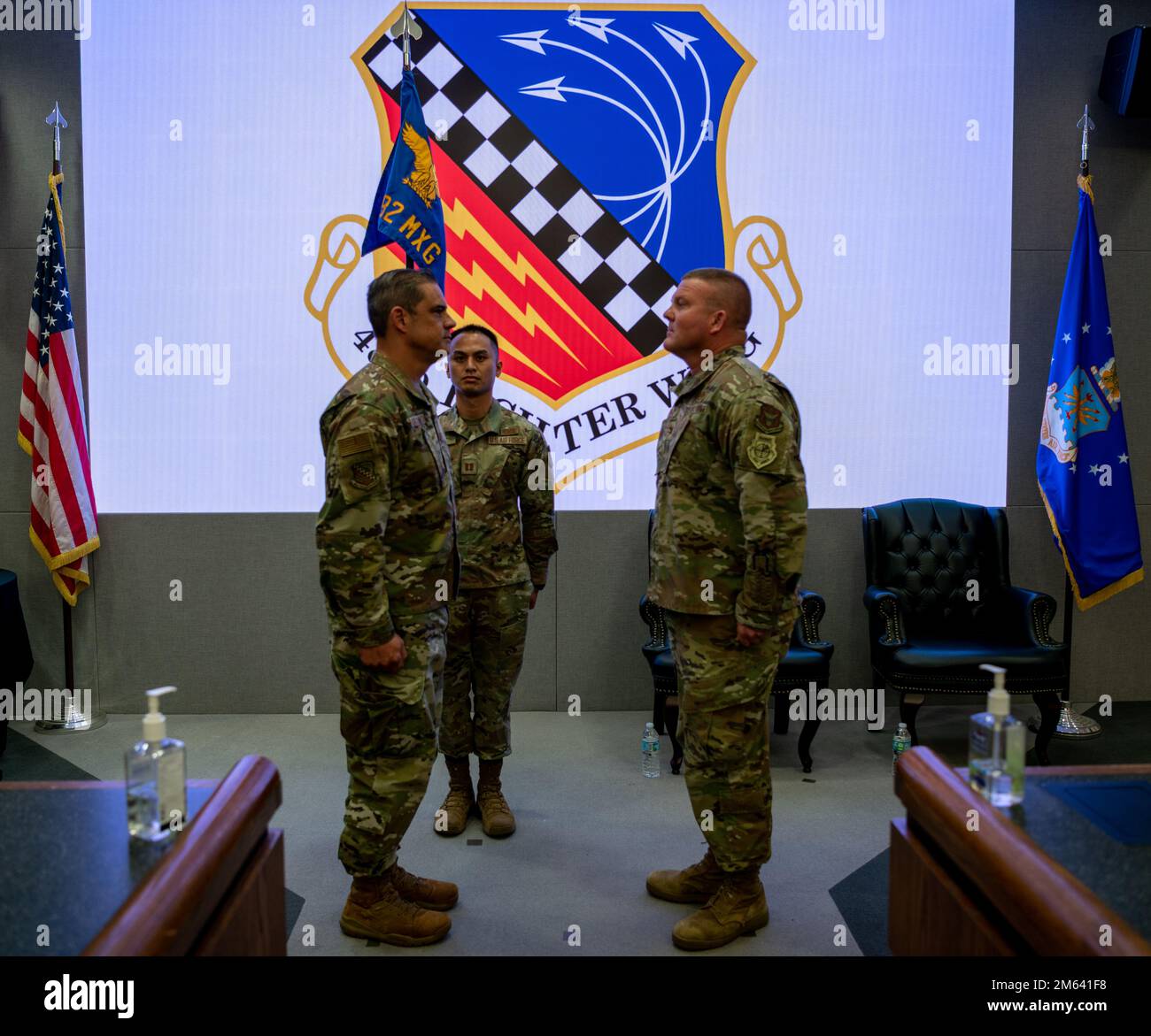 Col. David Castenada, Commander 482nd FW, prepares to pass the flag to ...
