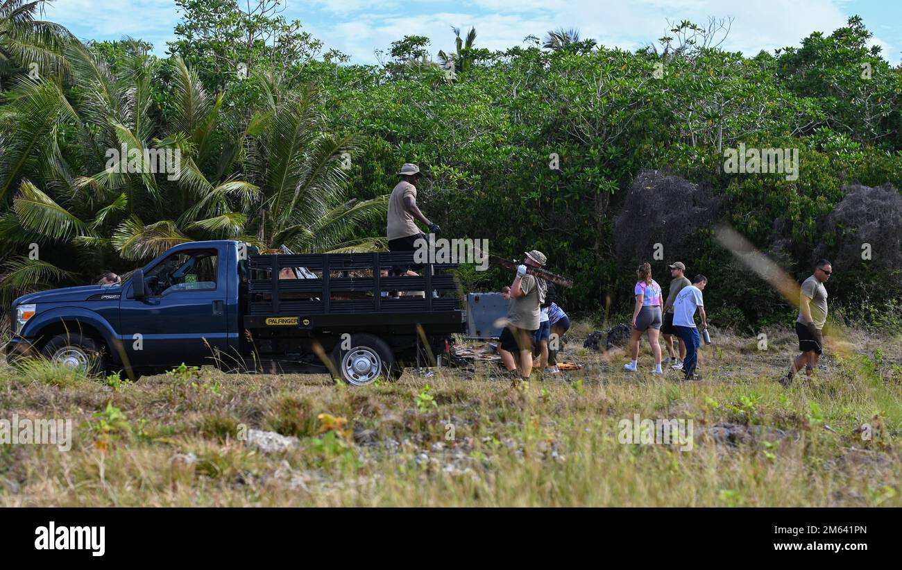 Members from the 36th Security Forces Squadron gather to clean the ...