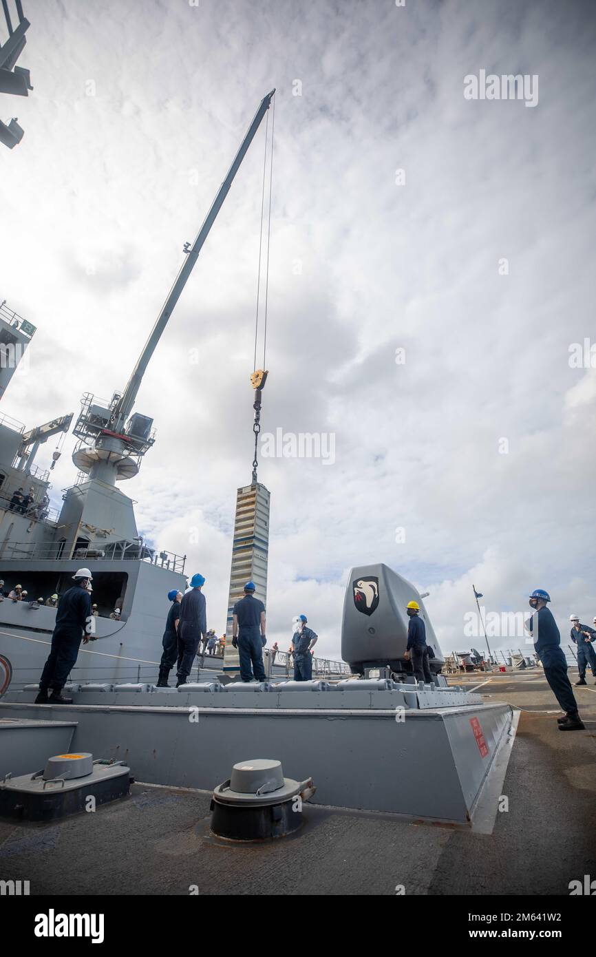 220330-N-KW492-1171 NAVAL BASE GUAM (March 30, 2022) A crane on the Dry Cargo and Ammunition ...