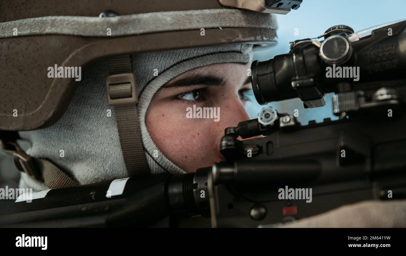 U.S. Marine Corps Lance Cpl. Drake Crouse engages with an opposing ...
