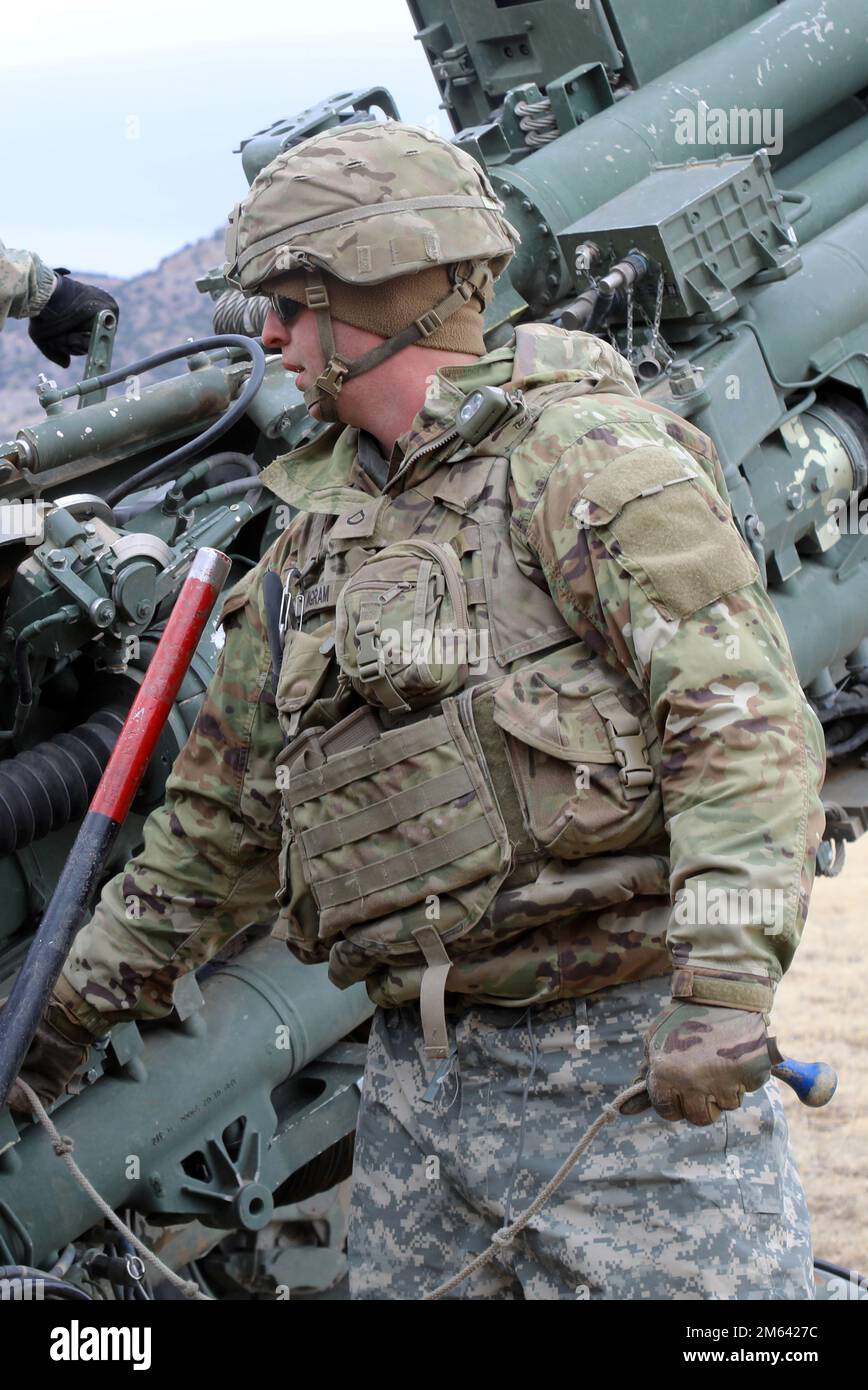 A Soldier with 2nd Battalion, 77th Field Artillery Regiment, 2nd ...