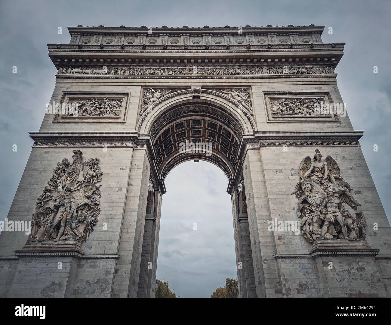 Triumphal Arch (Arc de triomphe) in Paris, France. Closeup architectural details of the famous ...