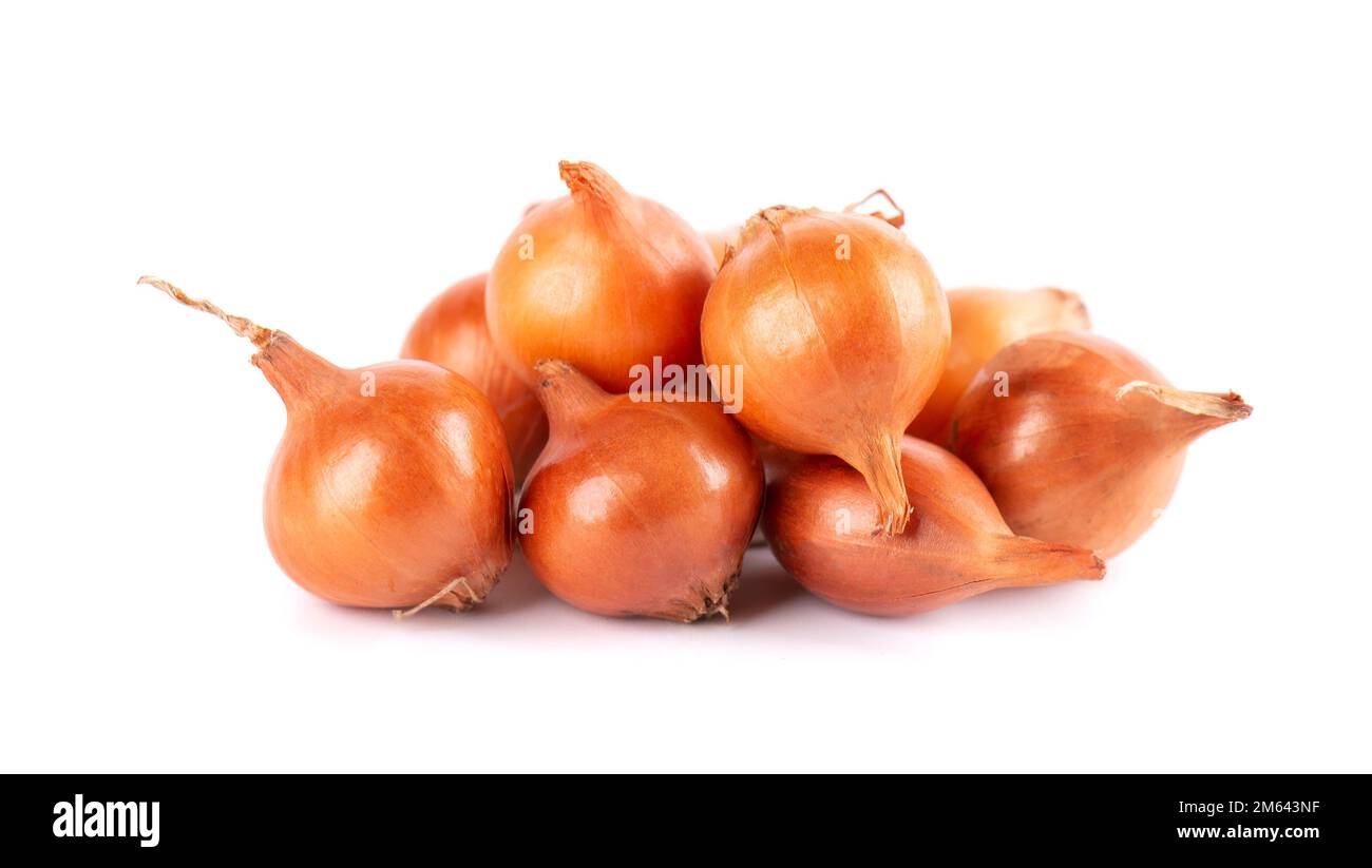 Brown mini onions isolated on a white background. Raw onion bulbs, for ...
