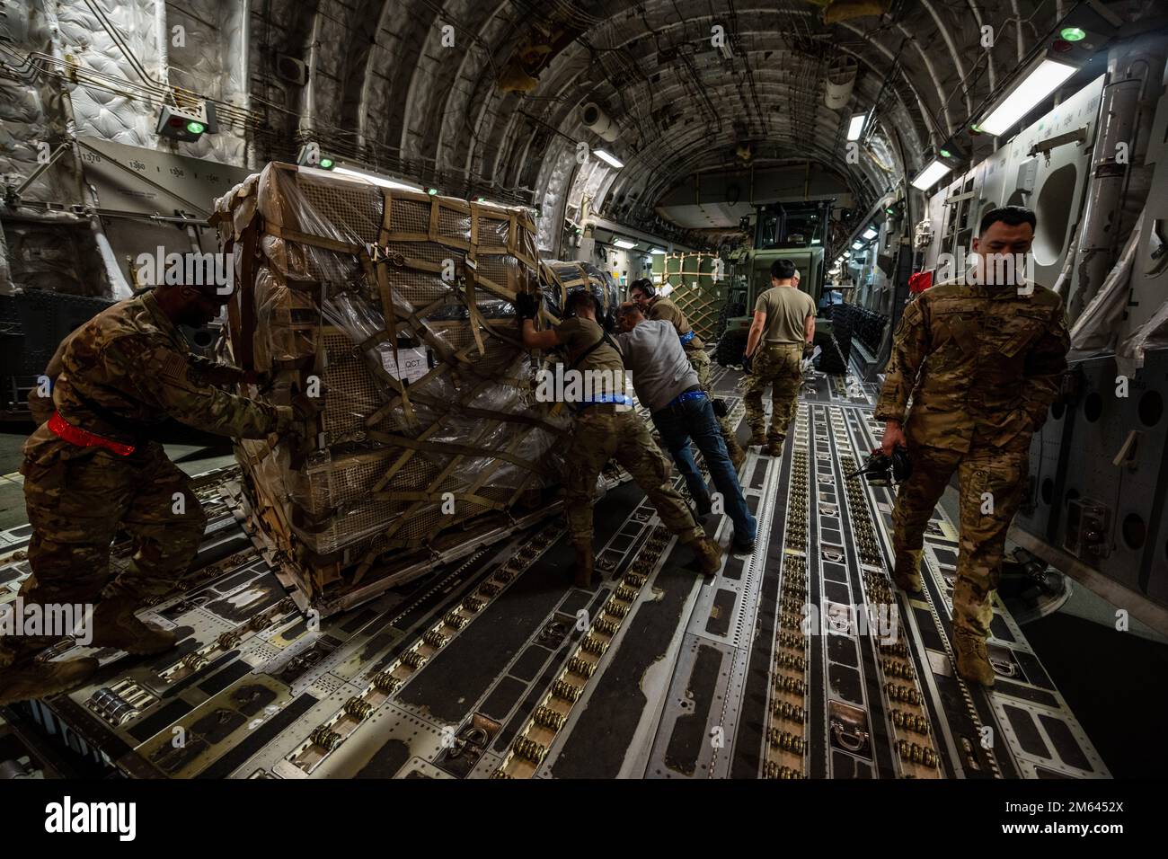 U.S. Airmen from the 60th Aerial Port Squadron ramp services and 8th ...