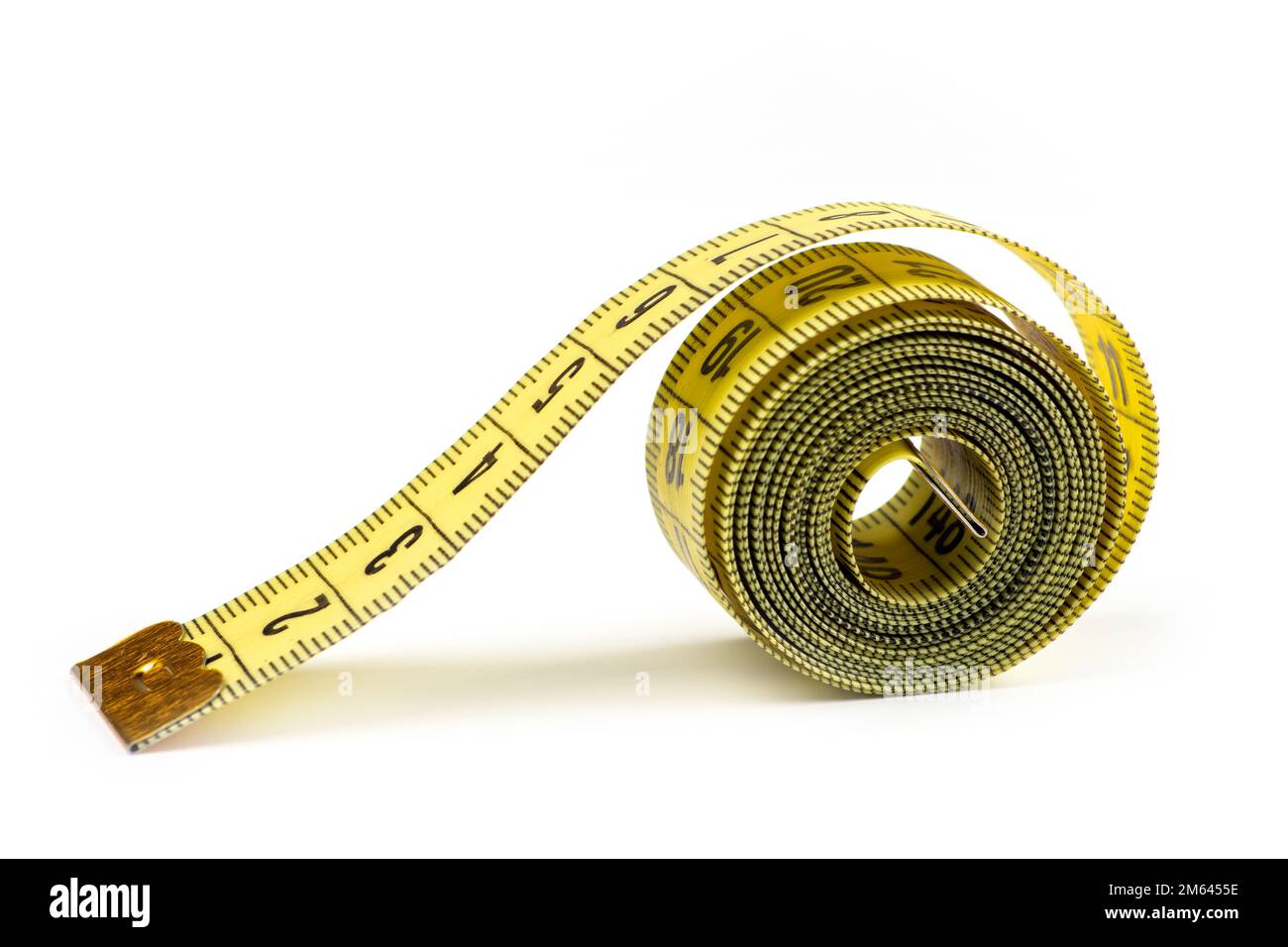 Yellow measuring tape isolated on white background Stock Photo - Alamy