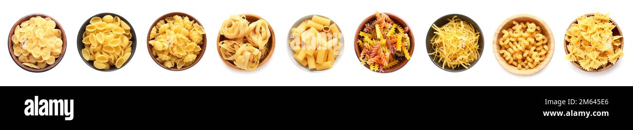 Collection of different types of Italian pasta in bowls on white ...