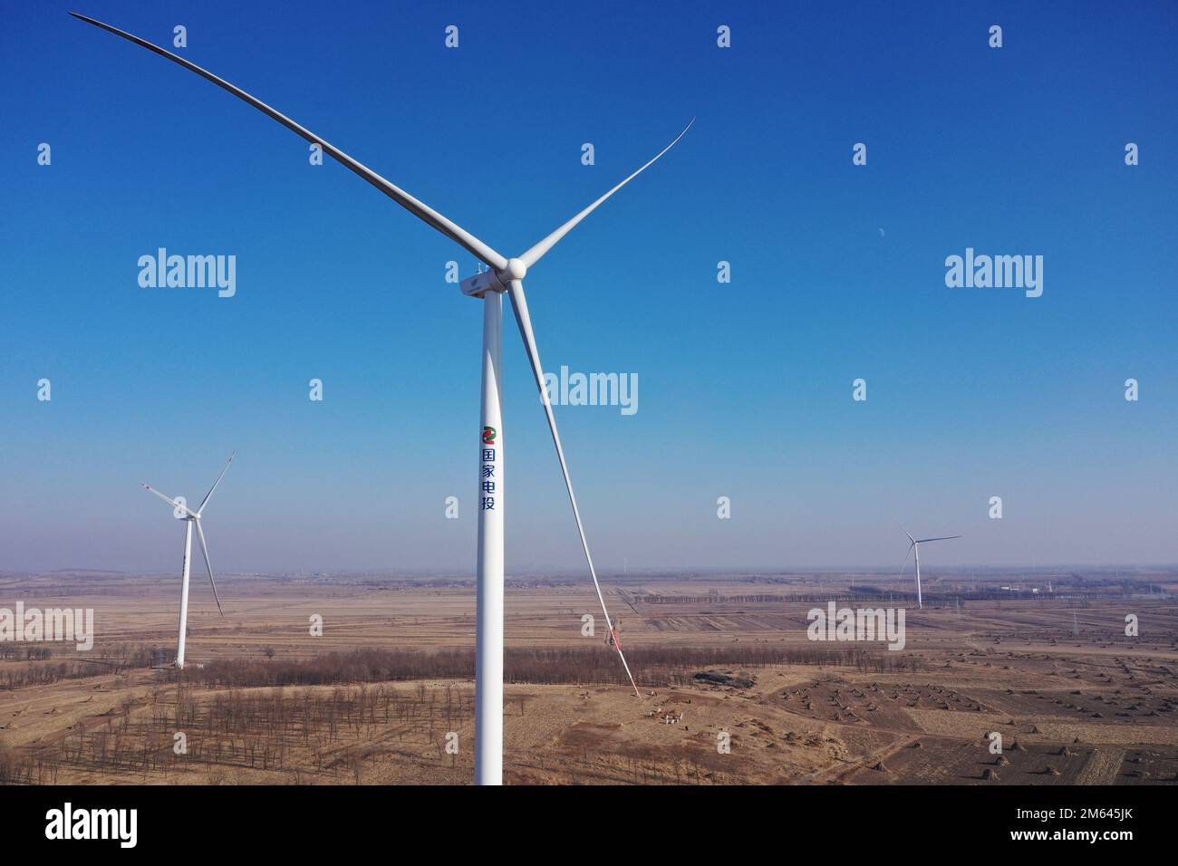 Liaoning. 2nd Jan, 2023. This photo shows a major onshore wind power ...