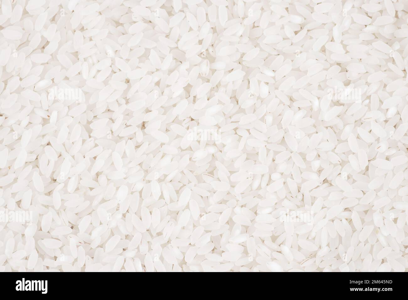 White long rice background, uncooked raw cereals, macro closeup Stock ...