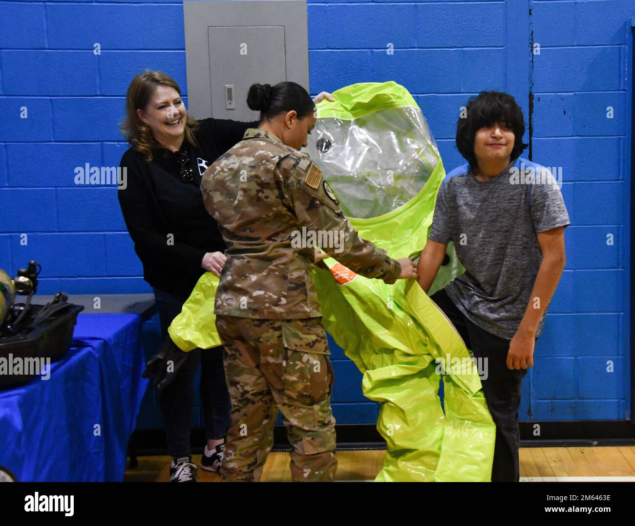 A student from Altus Junior High School tries on a Level A hazardous ...