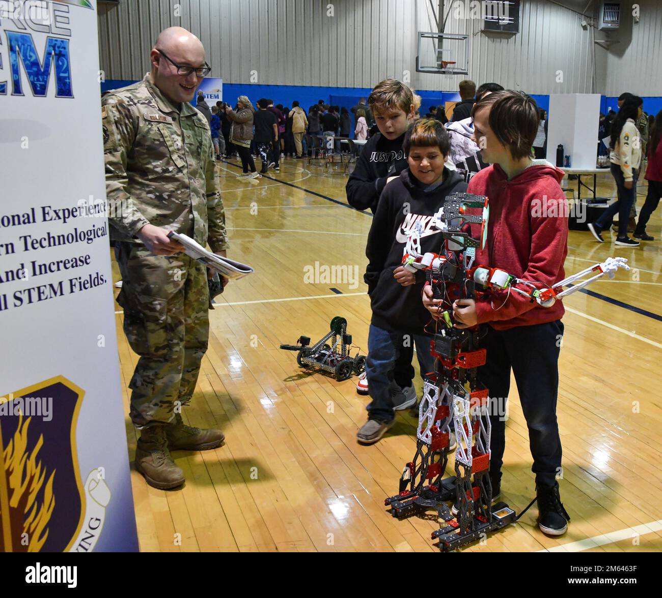 An Altus Junior High School student hugs a Meccano robot at Altus High ...