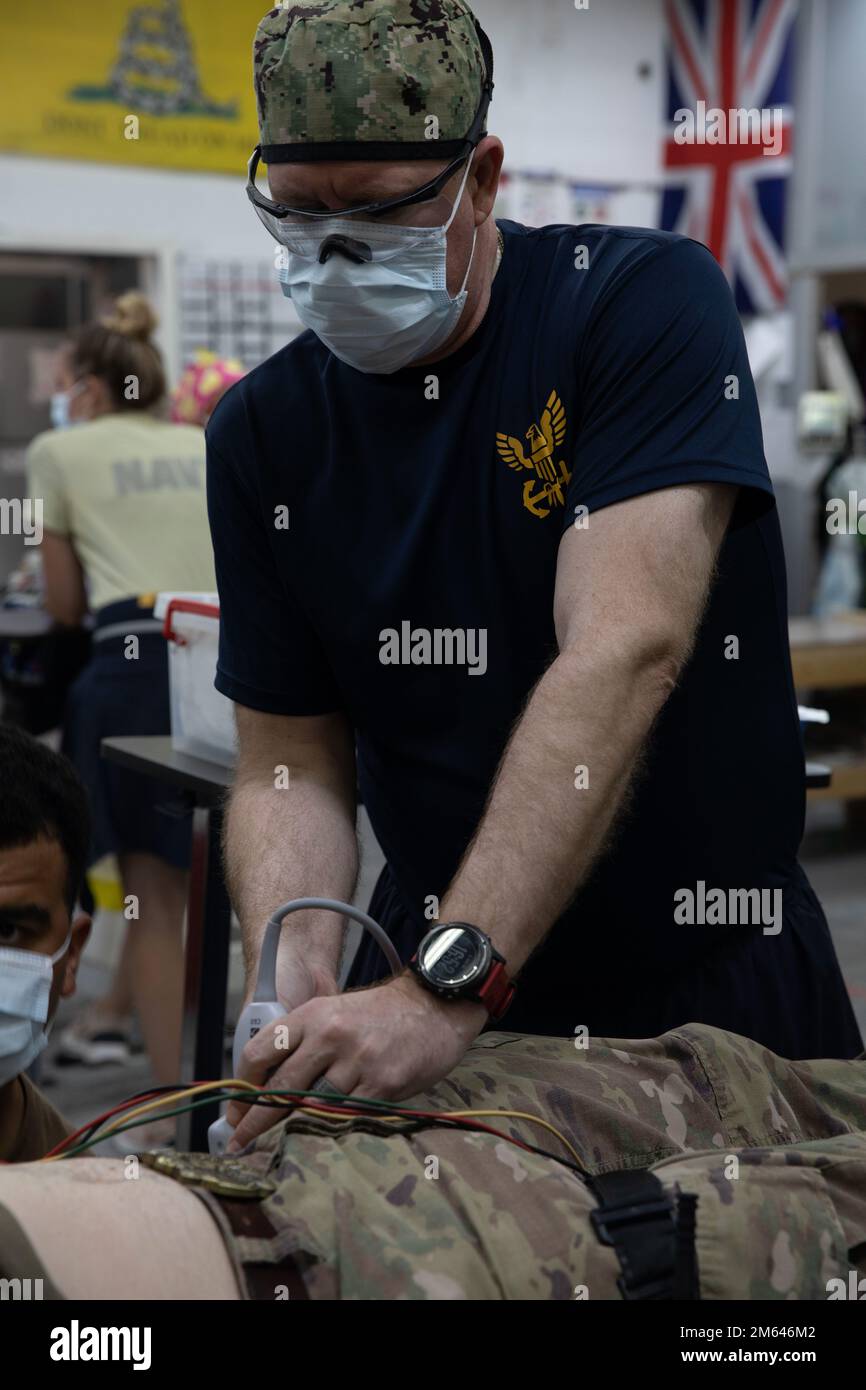 U.S. Navy Capt. Zachary Brown, assigned to the Expeditionary Medical ...