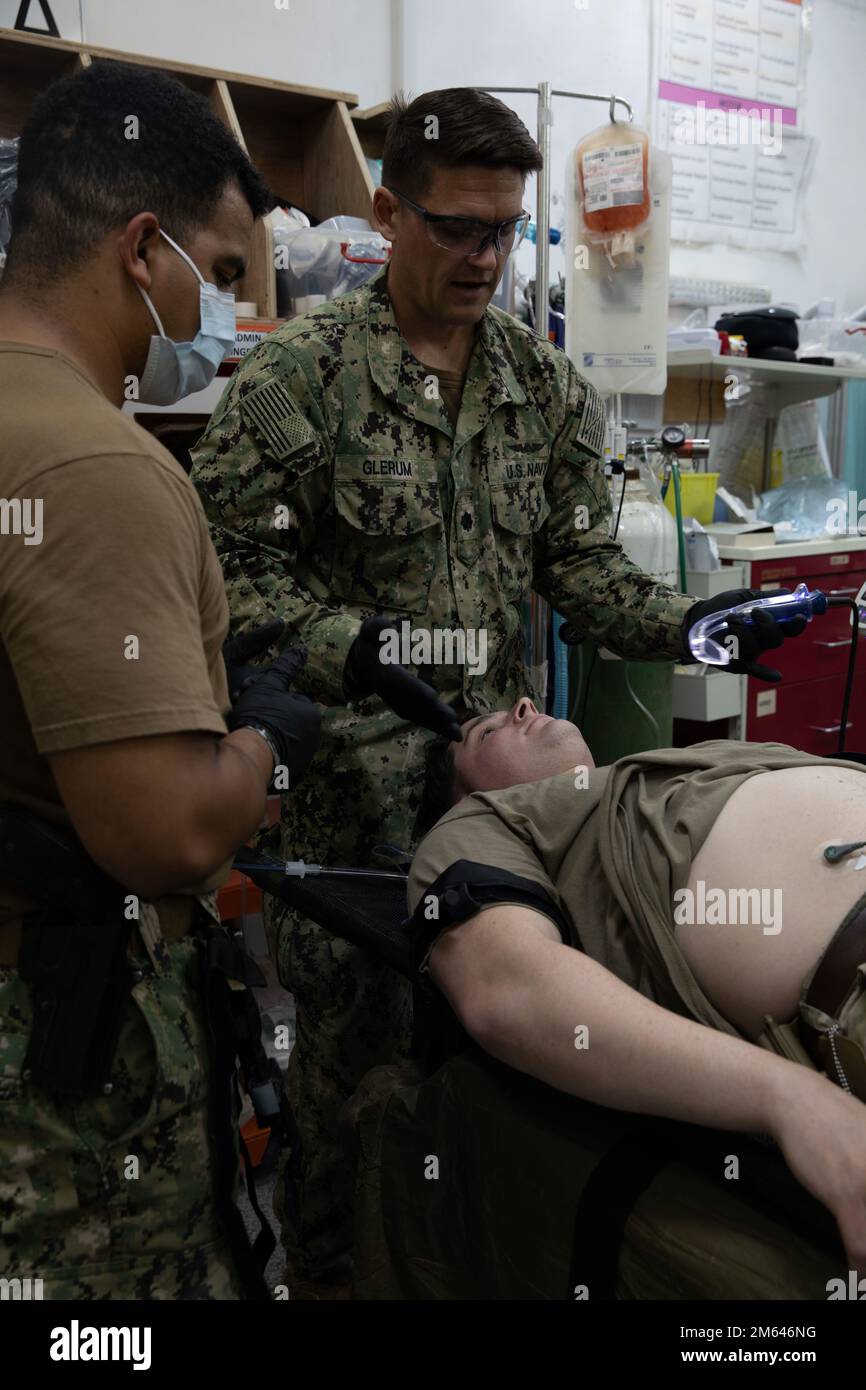 U s navy hospital corpsman demonstrates hi-res stock photography and ...