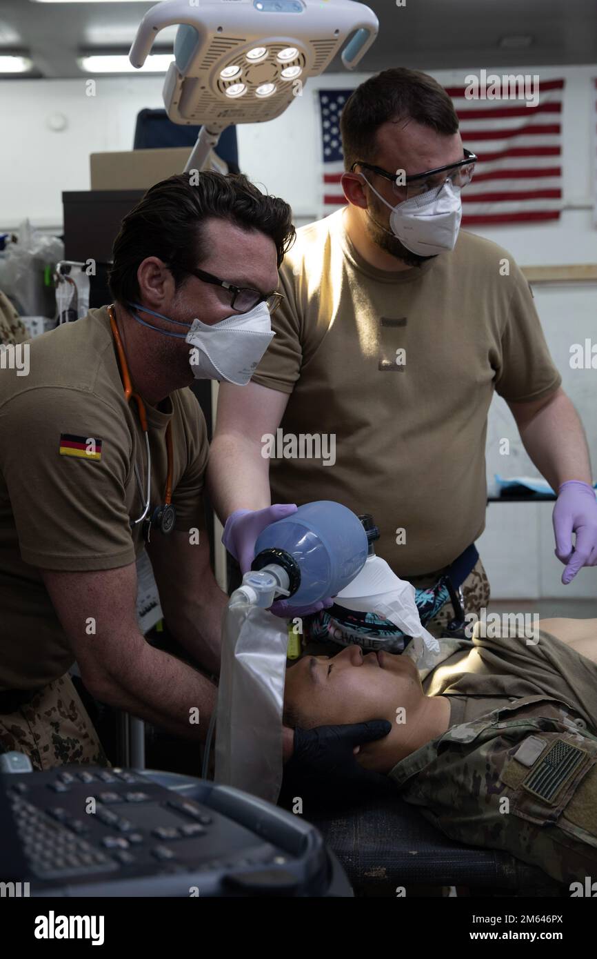 The German Surgical Team checks the neck stability of a simulated ...