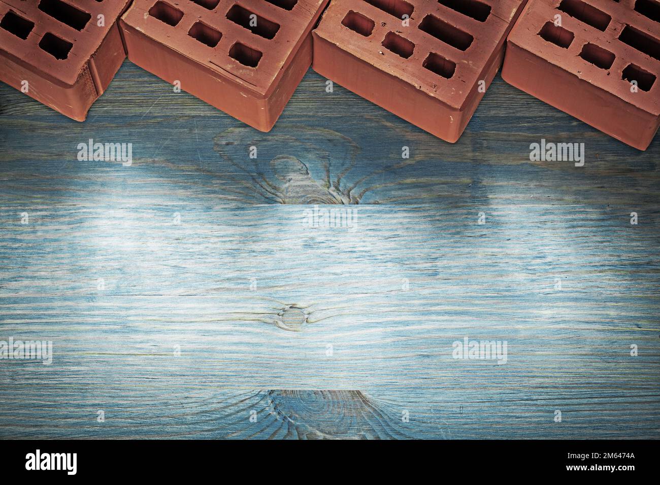 Set of construction bricks on wooden board bricklaying concept Stock ...