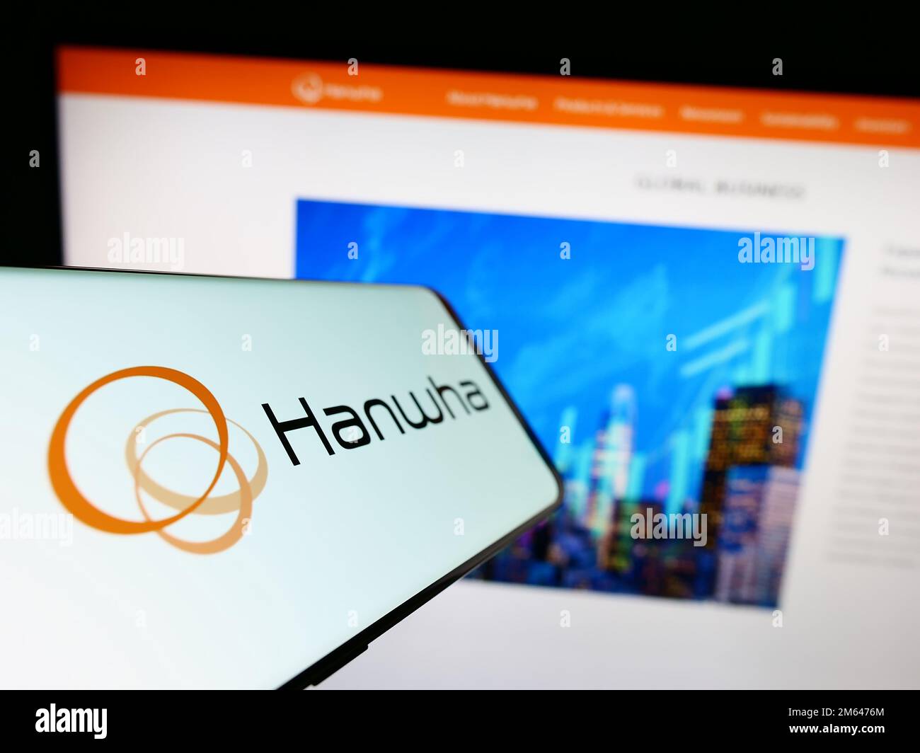 Smartphone with logo of South Korean company Hanwha Group on screen in ...