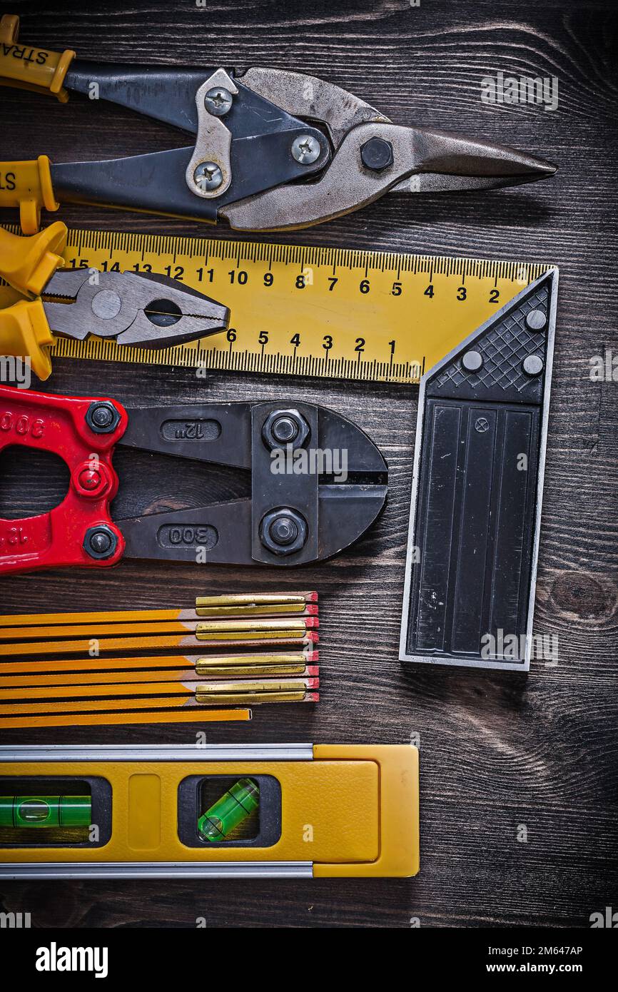 Square ruler pliers construction level wooden meter tin snips Stock ...