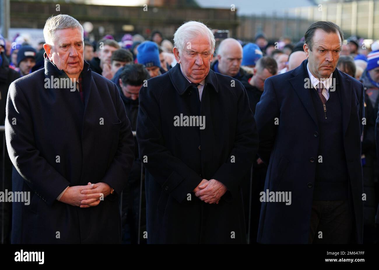 Rangers Chairman Douglas Park (left) observe a moments silence ...