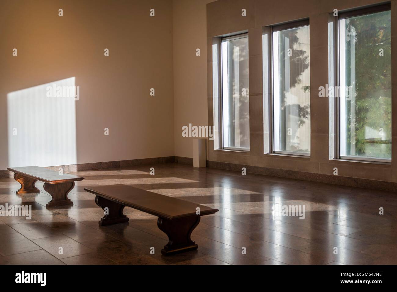 Airy interior with two benches in the Metropolitan Museum of Art, New ...