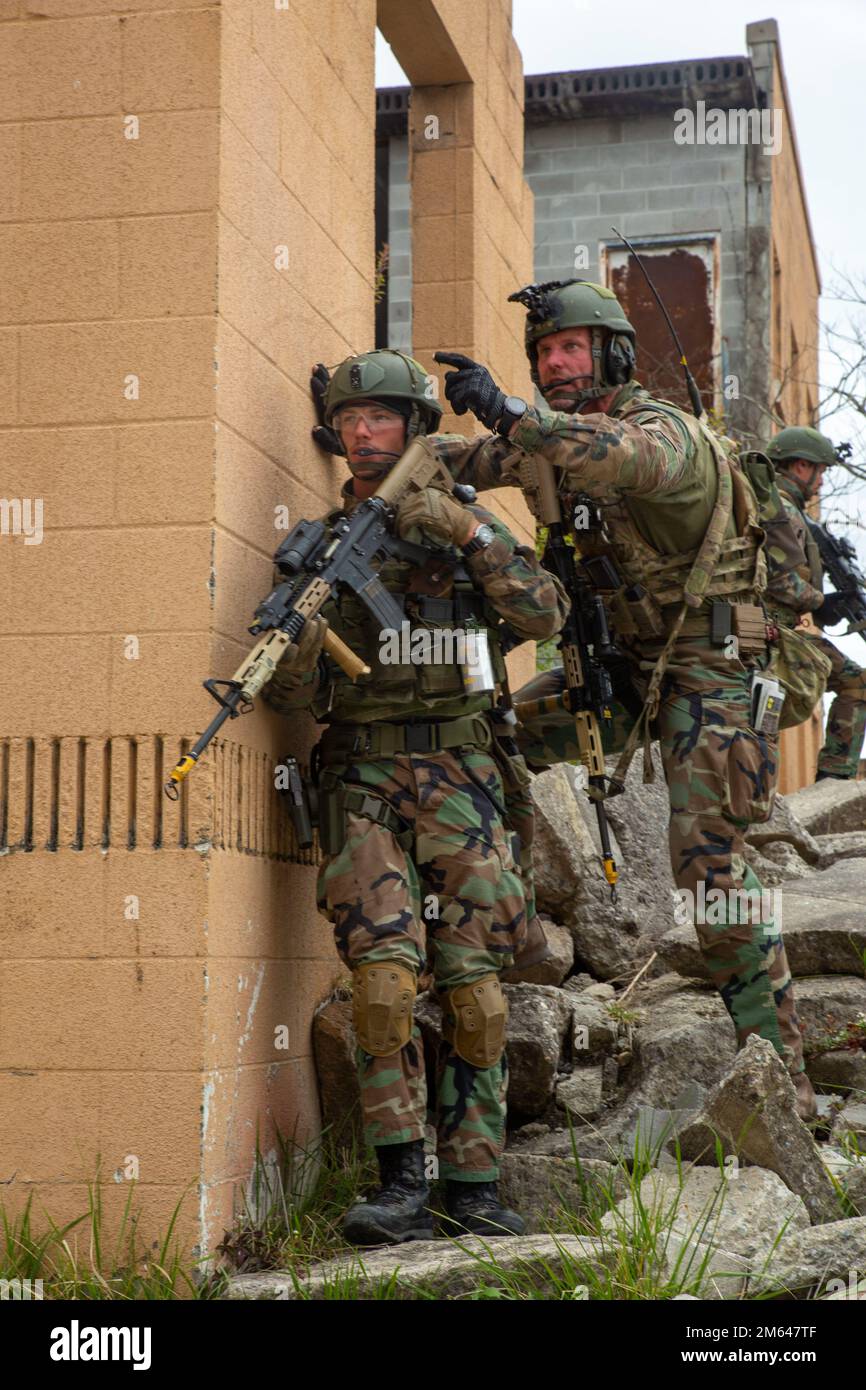 Dutch Marines with Marine Squadron Carib post security during a ...