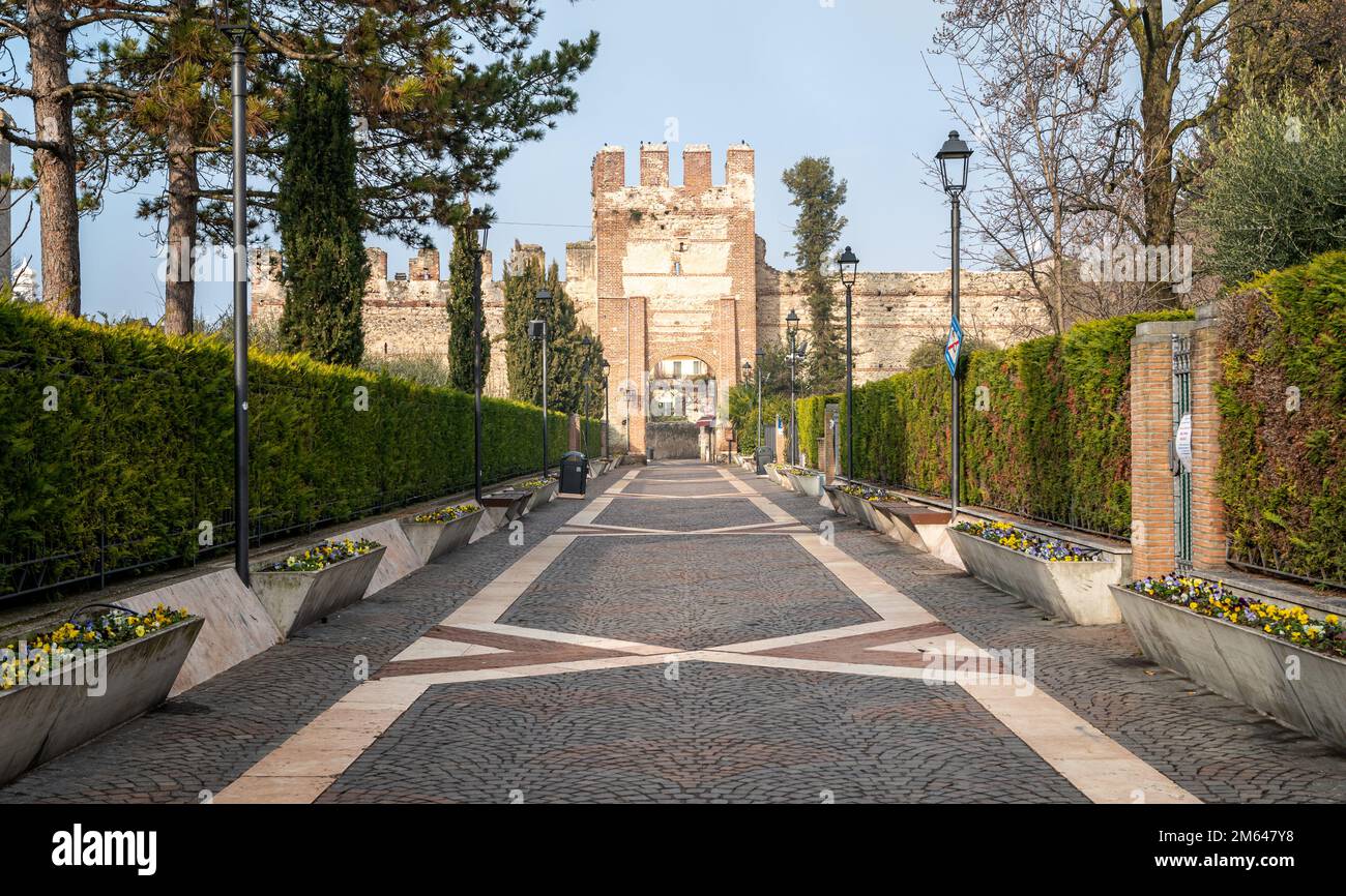 Gate of Lion of Saint Mark and tower of the walled town of Lazise on ...