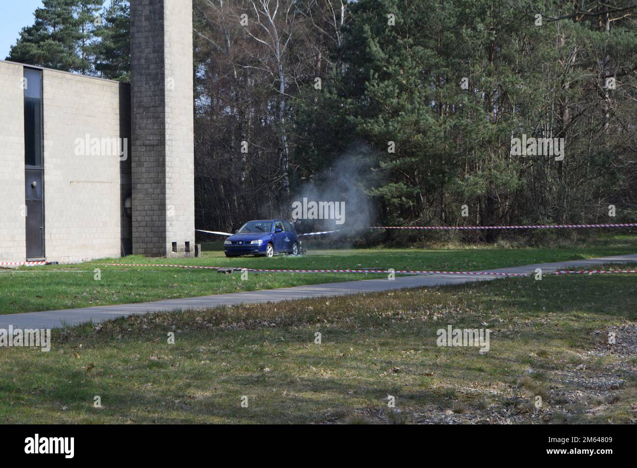A water bullet bursts the window of a car carrying a mock vehicle-borne ...