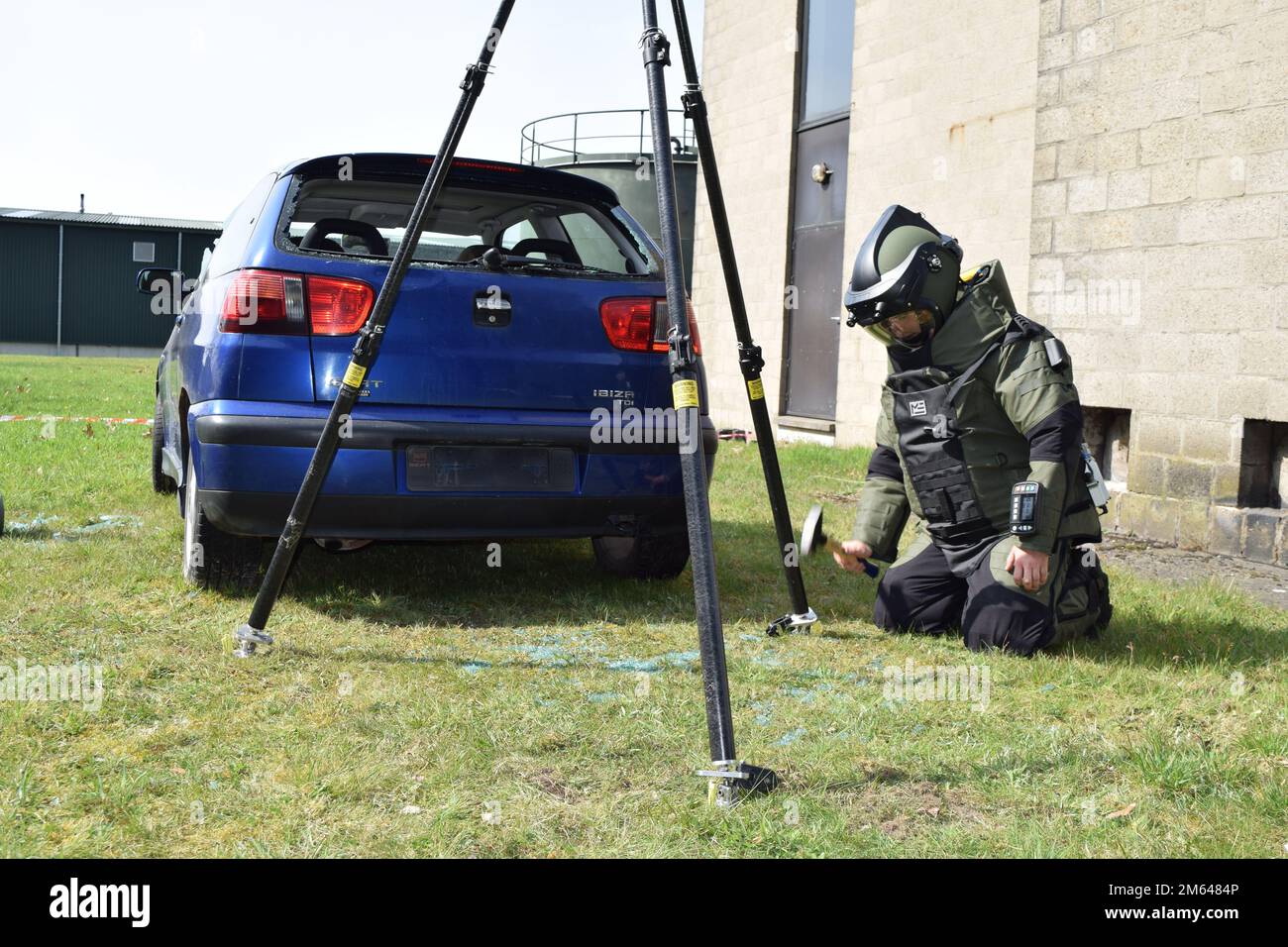 A member of the Belgian explosive ordnance disposal unit stakes a ...