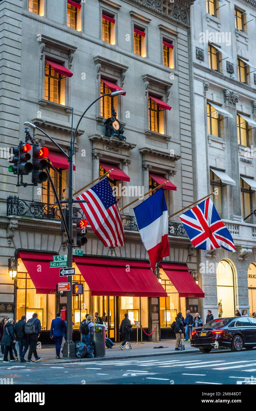 American, French and British flags on a building in the 5th avenue, New ...