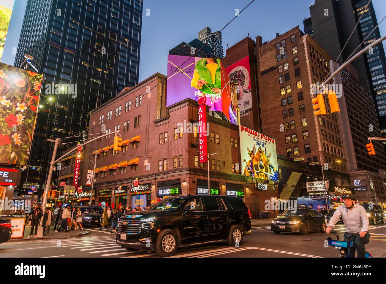 Busy 7th avenue with West 50th Street at night, New York City, USA ...