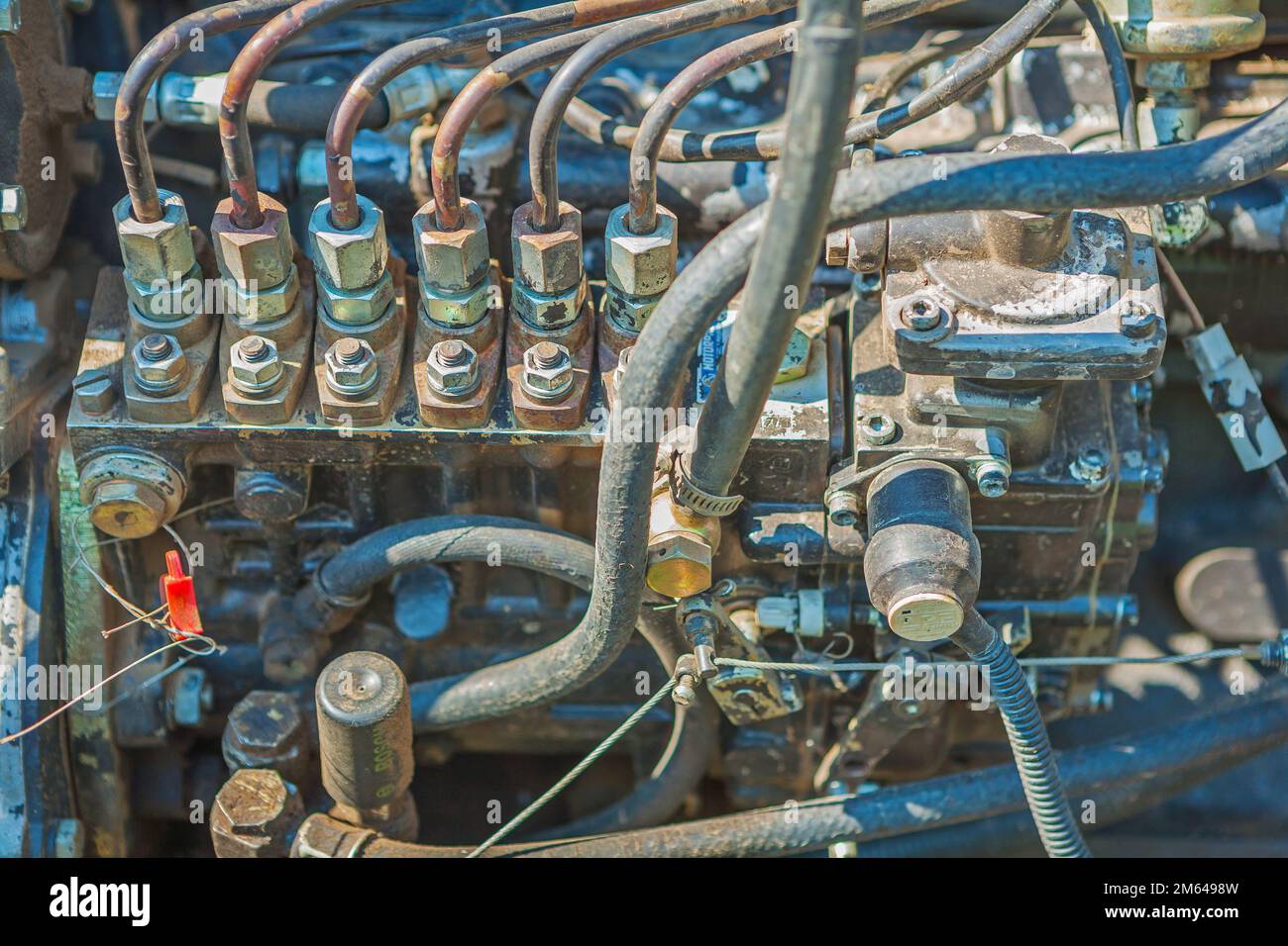 view on the old messy fuel pump of a high pressure the diesel motor ...