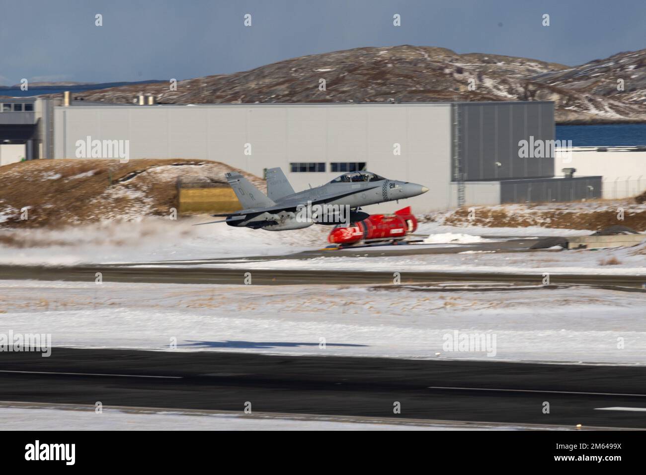A U.S. Marine Corps F/A-18 Hornet takes off from Norwegian Air Base ...