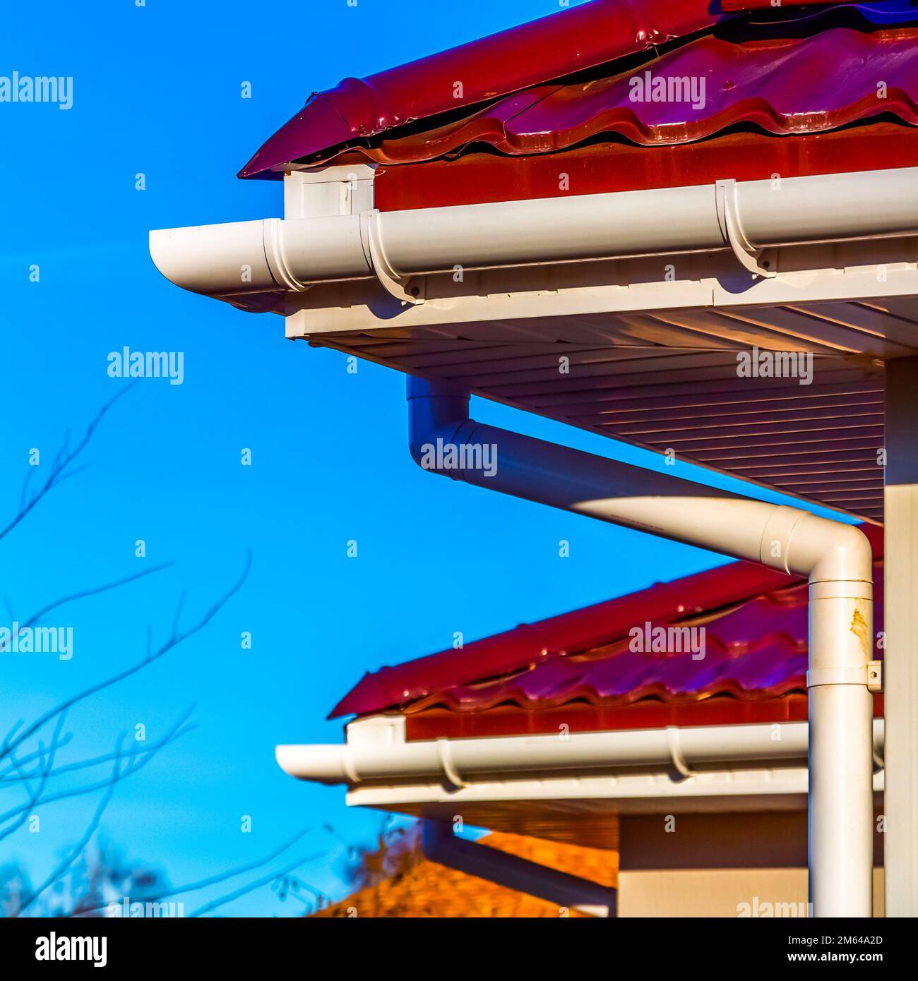 White plastic drainage system of a private house Stock Photo - Alamy
