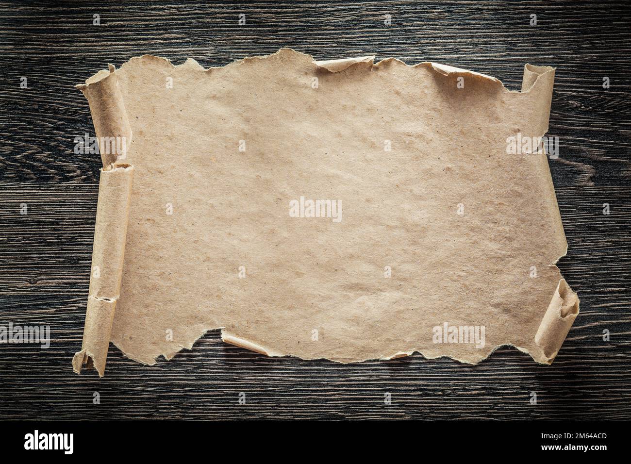 Vintage paper roll on black board Stock Photo - Alamy