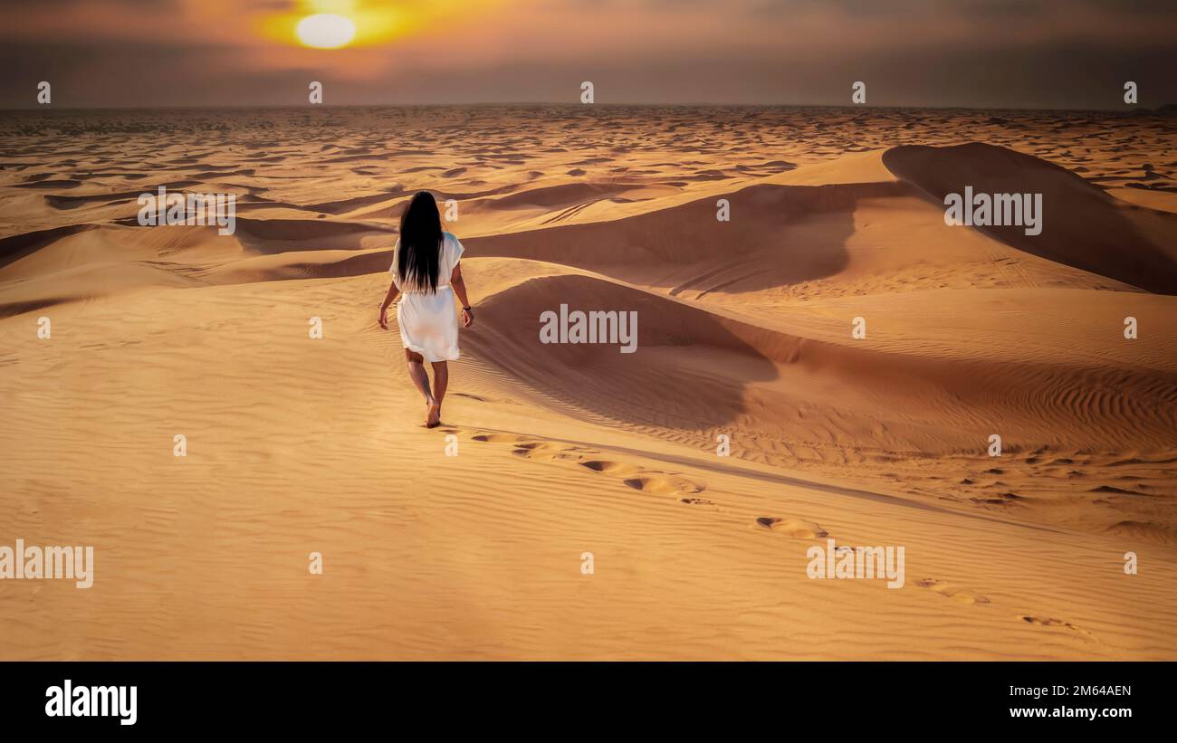 Dubai dessert sand dunes, Asian women on Dubai desert safari,United ...
