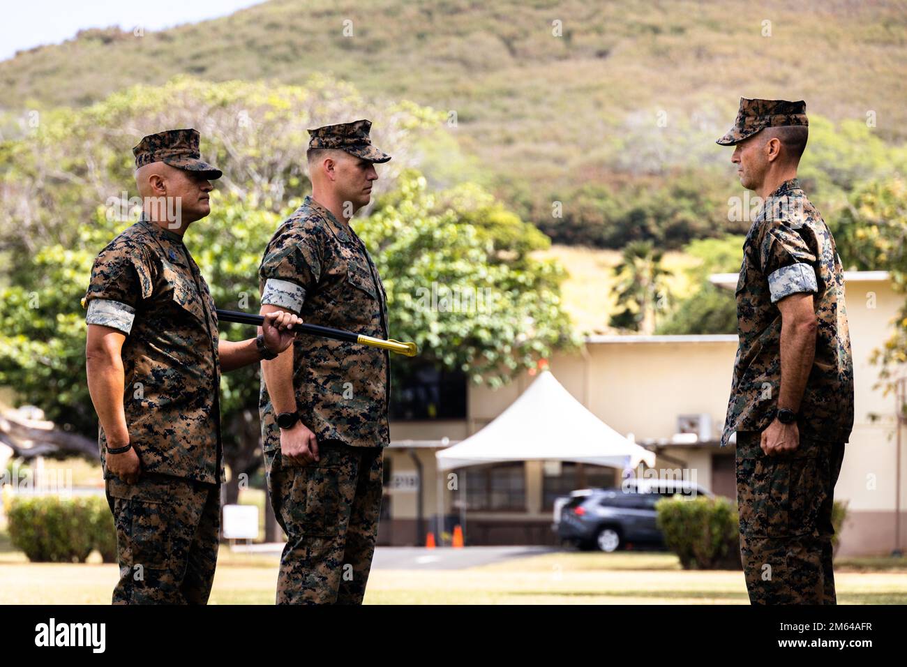 U.S. Marine Corps Sgt. Maj. Jose Romero, left, offgoing sergeant major ...