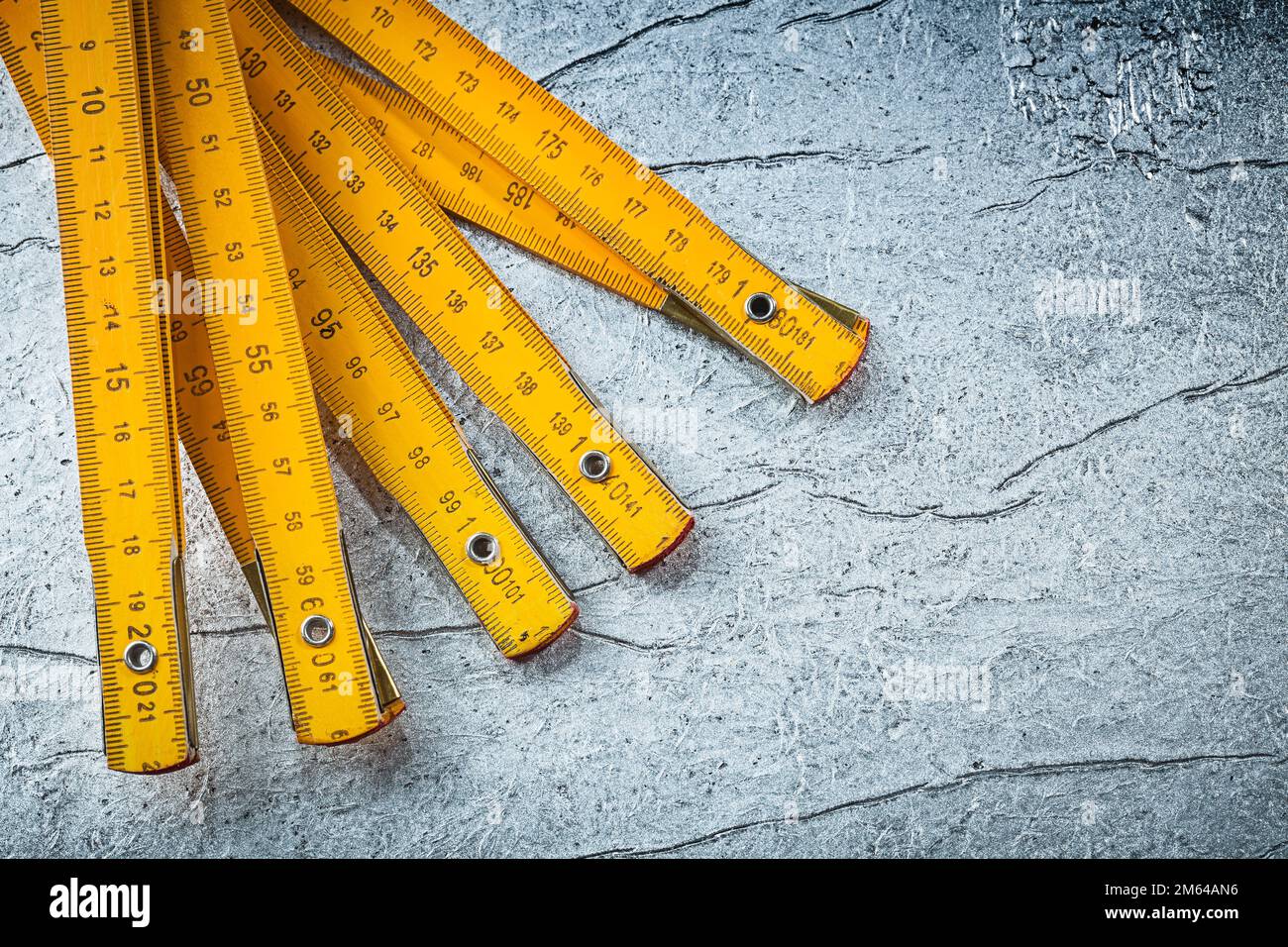 Wooden meter on metallic background top view construction concept Stock ...