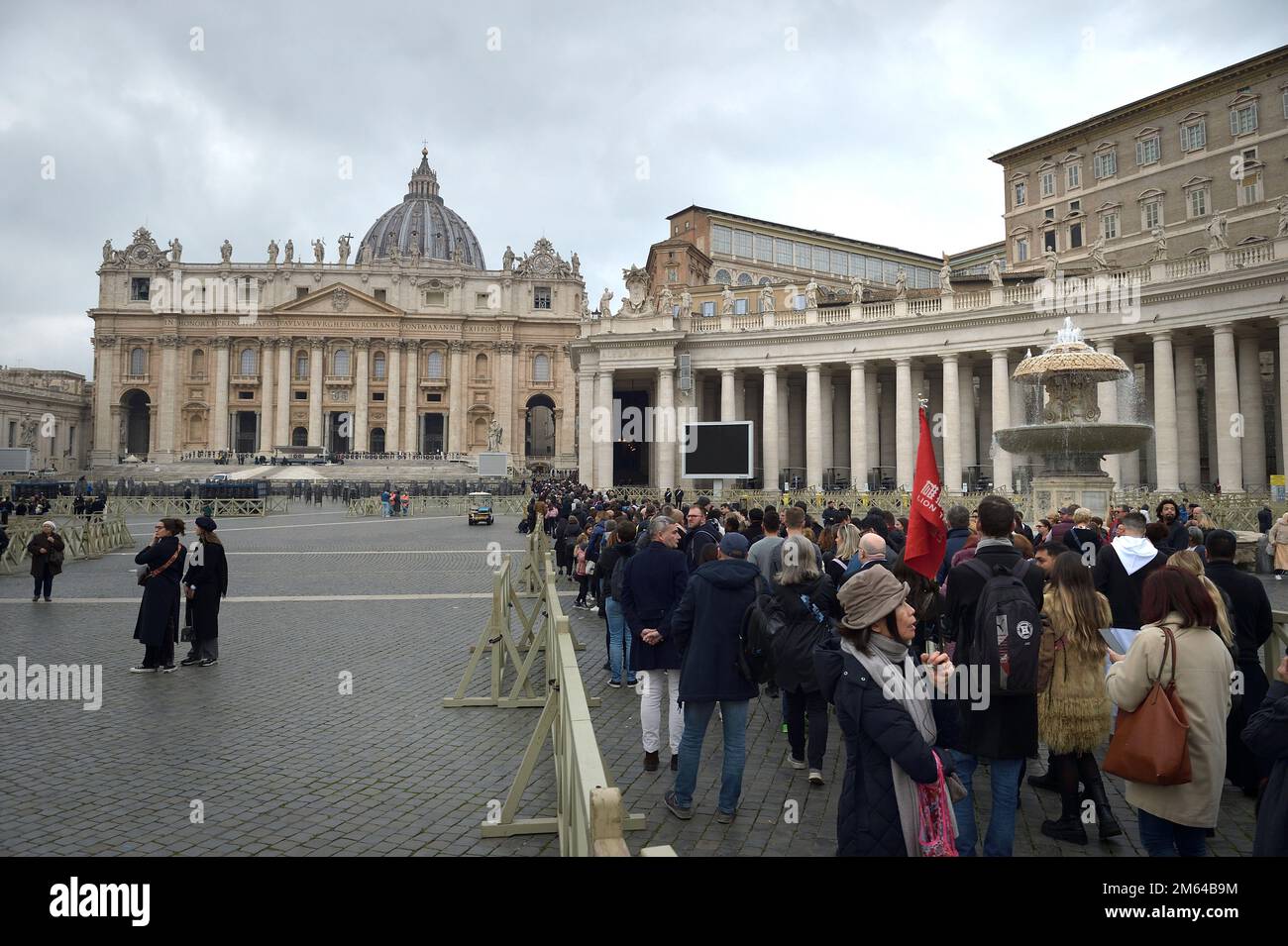 Vatican City State, . 02nd Jan, 2023. People wait in a line to enter ...