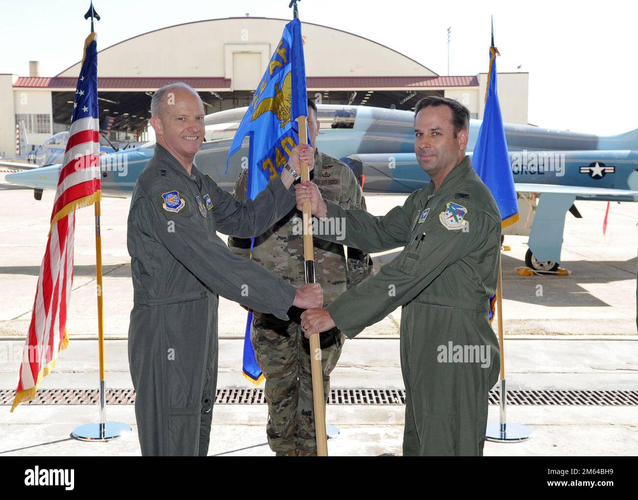 Maj. Gen. Bret C. Larson, 22nd Air Force commander, presents the 340th ...
