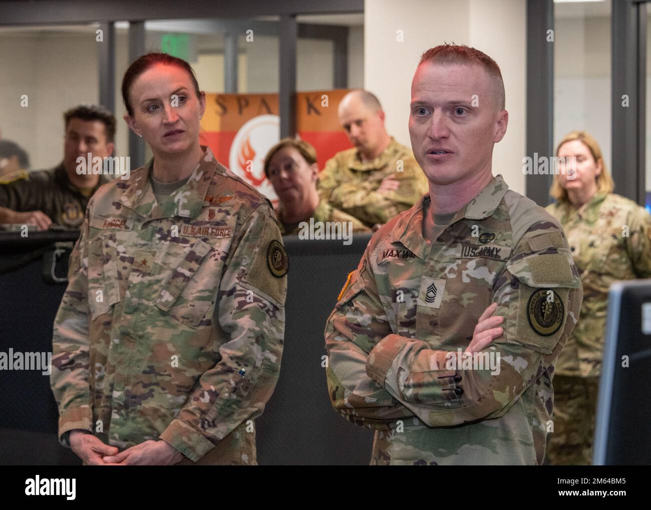 U.S. Air Force Brig. Gen. Anita Fligge, left, Defense Health Agency ...