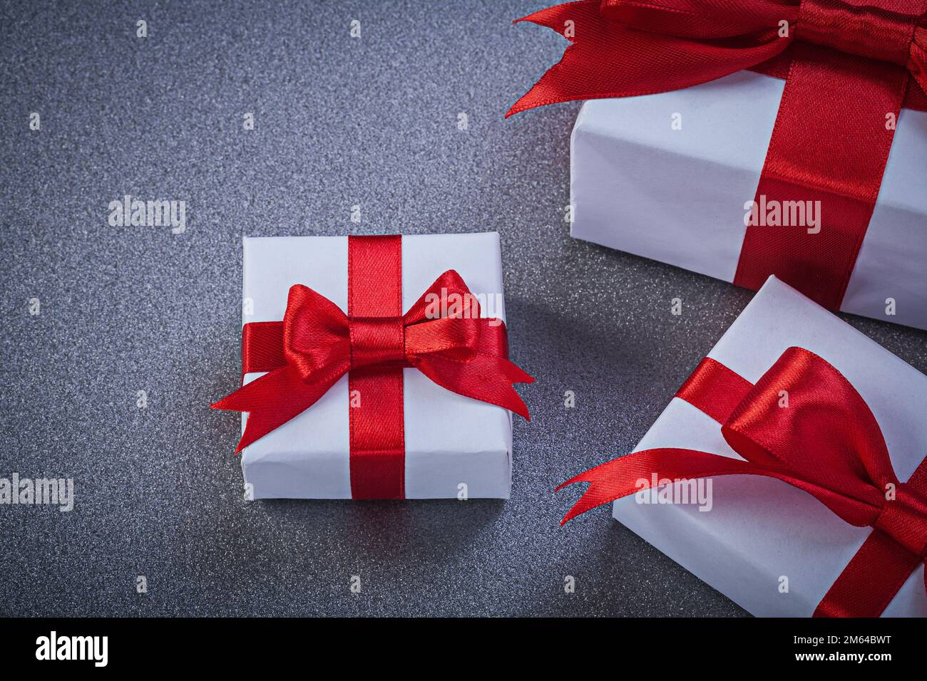 Composition of packed present boxes on grey surface holidays concept ...