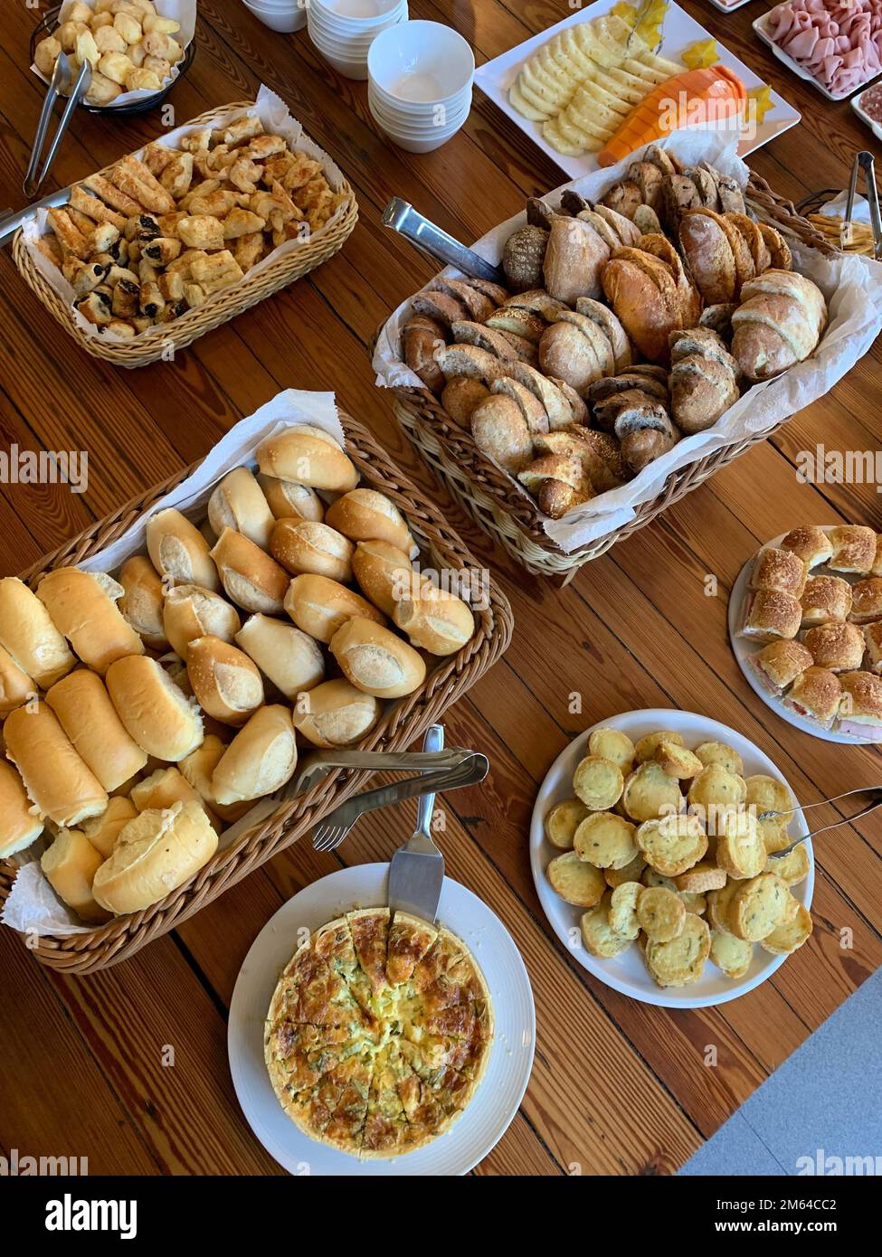 Overview of a full bread table for breakfast Stock Photo - Alamy
