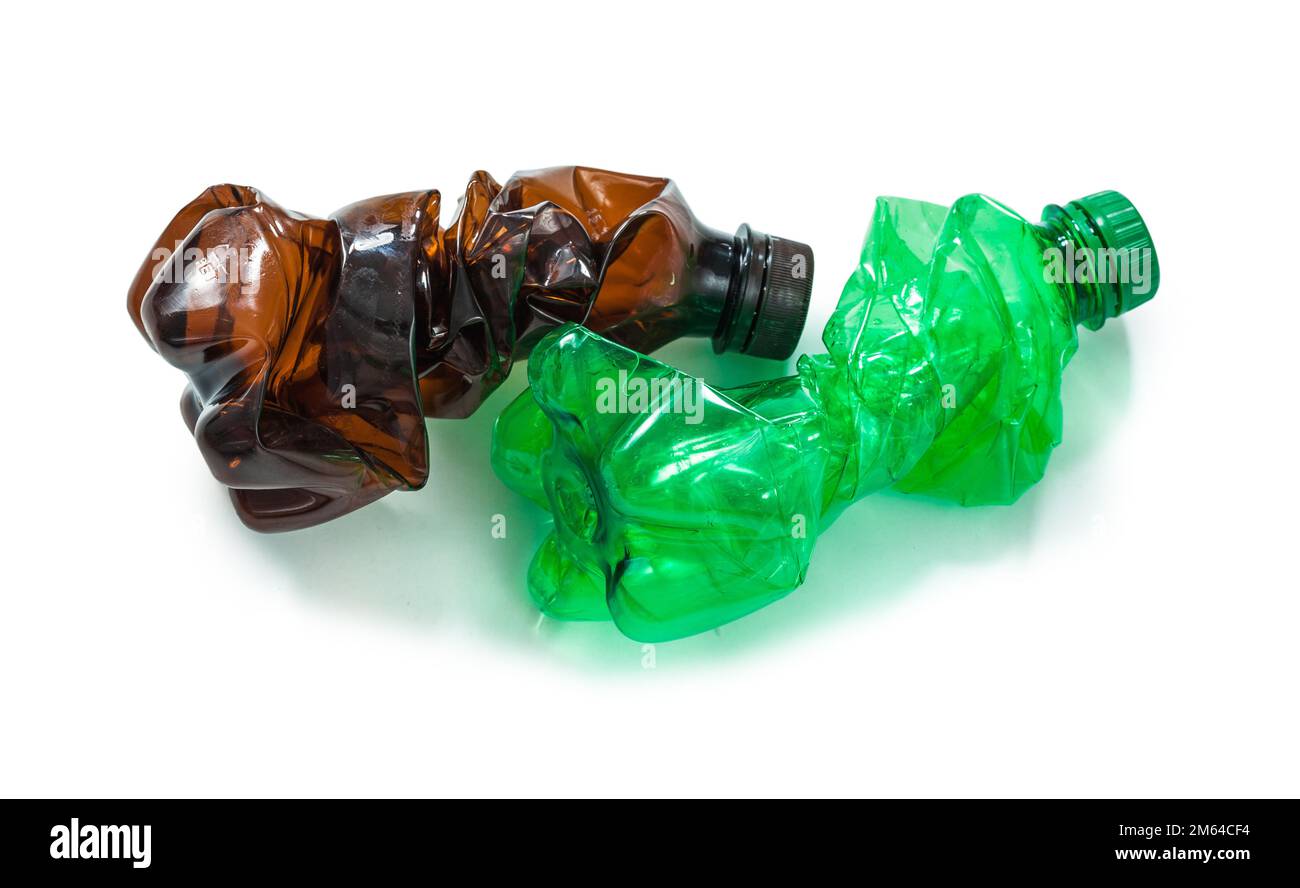 two crumpled plastic bottles garbage isolated Stock Photo - Alamy