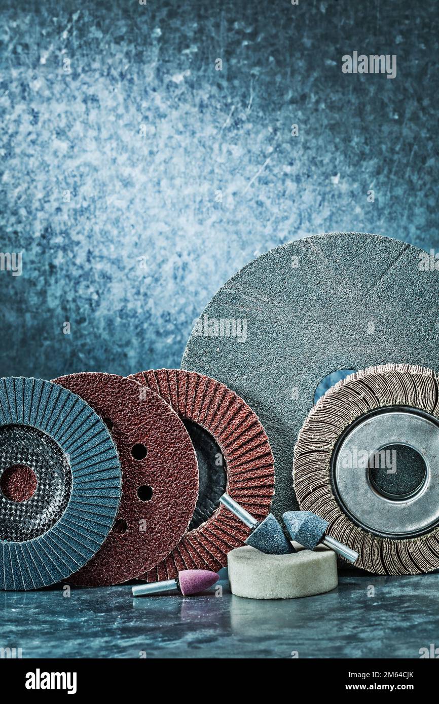 vertical version set of abrasive tools on metalic background Stock ...