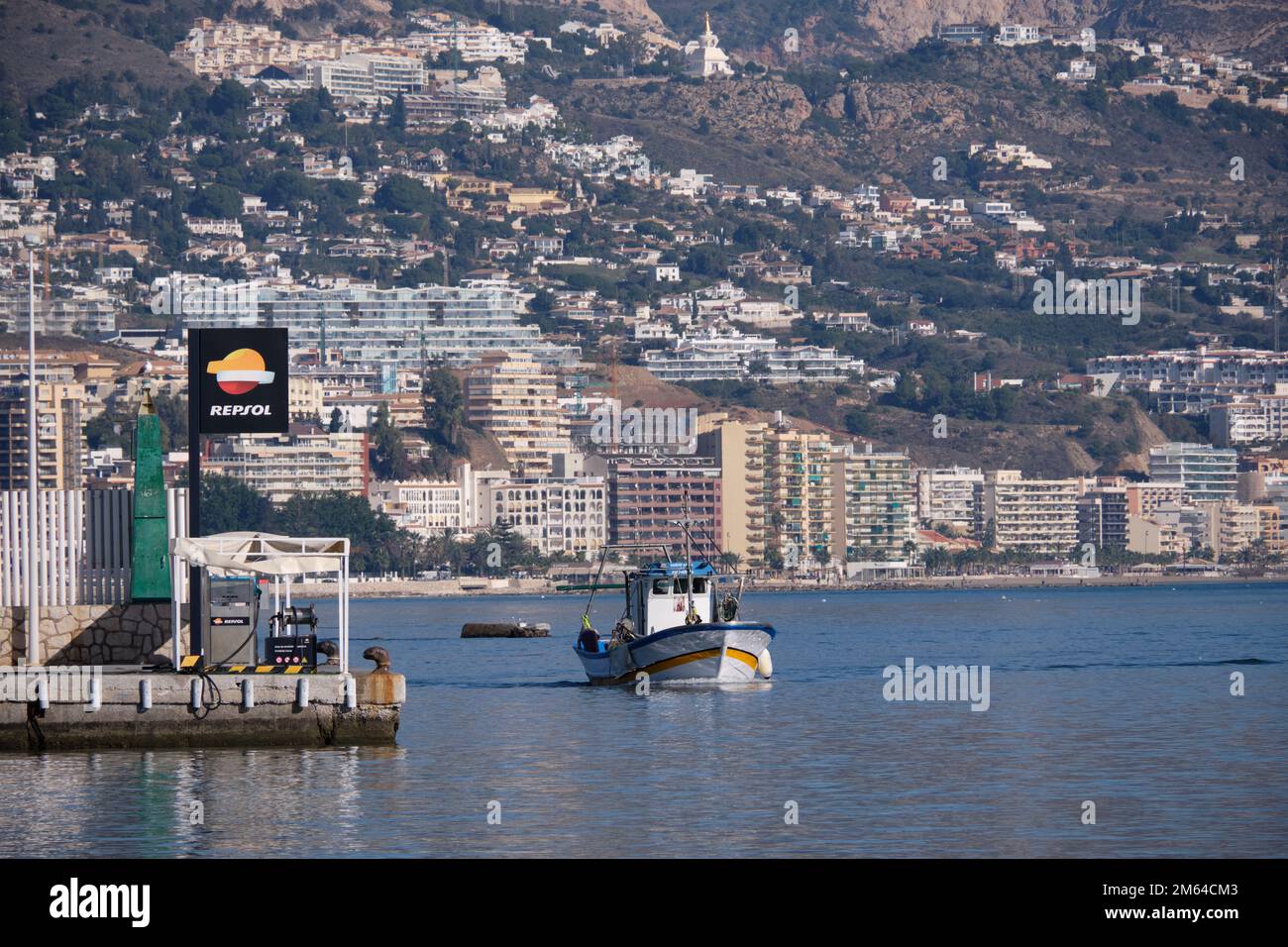 Fishing boat returning to the port of Fuengirola, Málaga, Spain Stock ...