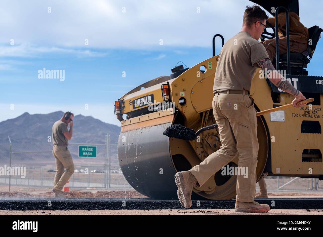 Airmen from the 820th RED HORSE Squadron operate heavy equipment to ...